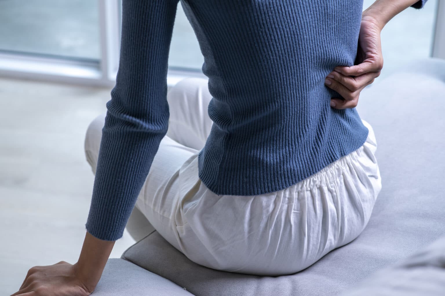 Back Pain When Sitting: Causes, Posture, and Treatments - OrthoNJ